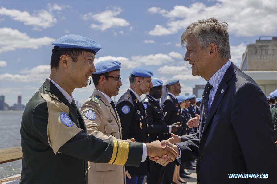 Two Chinese military officers awarded UN peacekeeping medal - Ministry of National Defense
